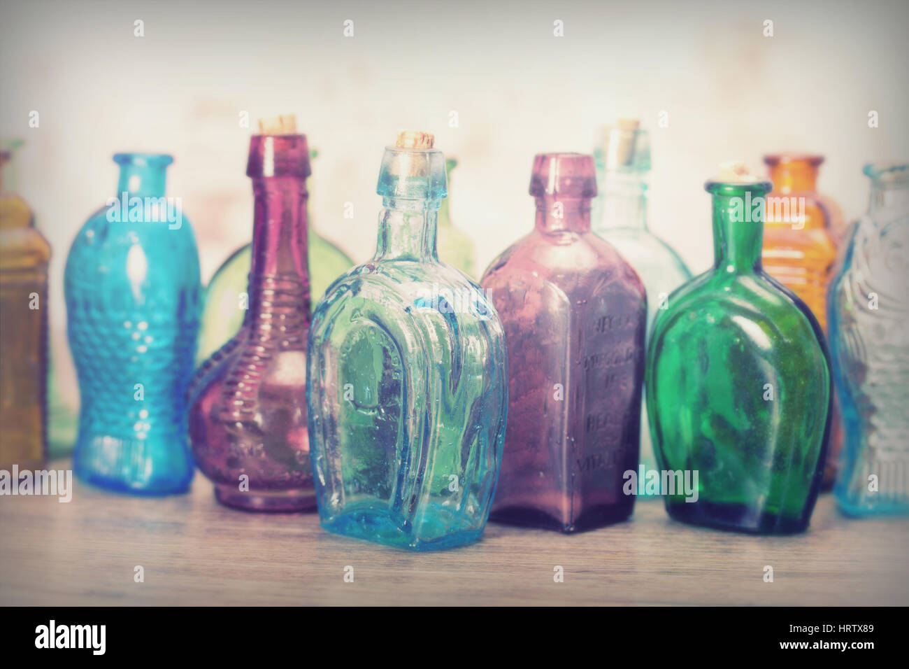 Coloured glass bottles hi-res stock photography and images - Alamy