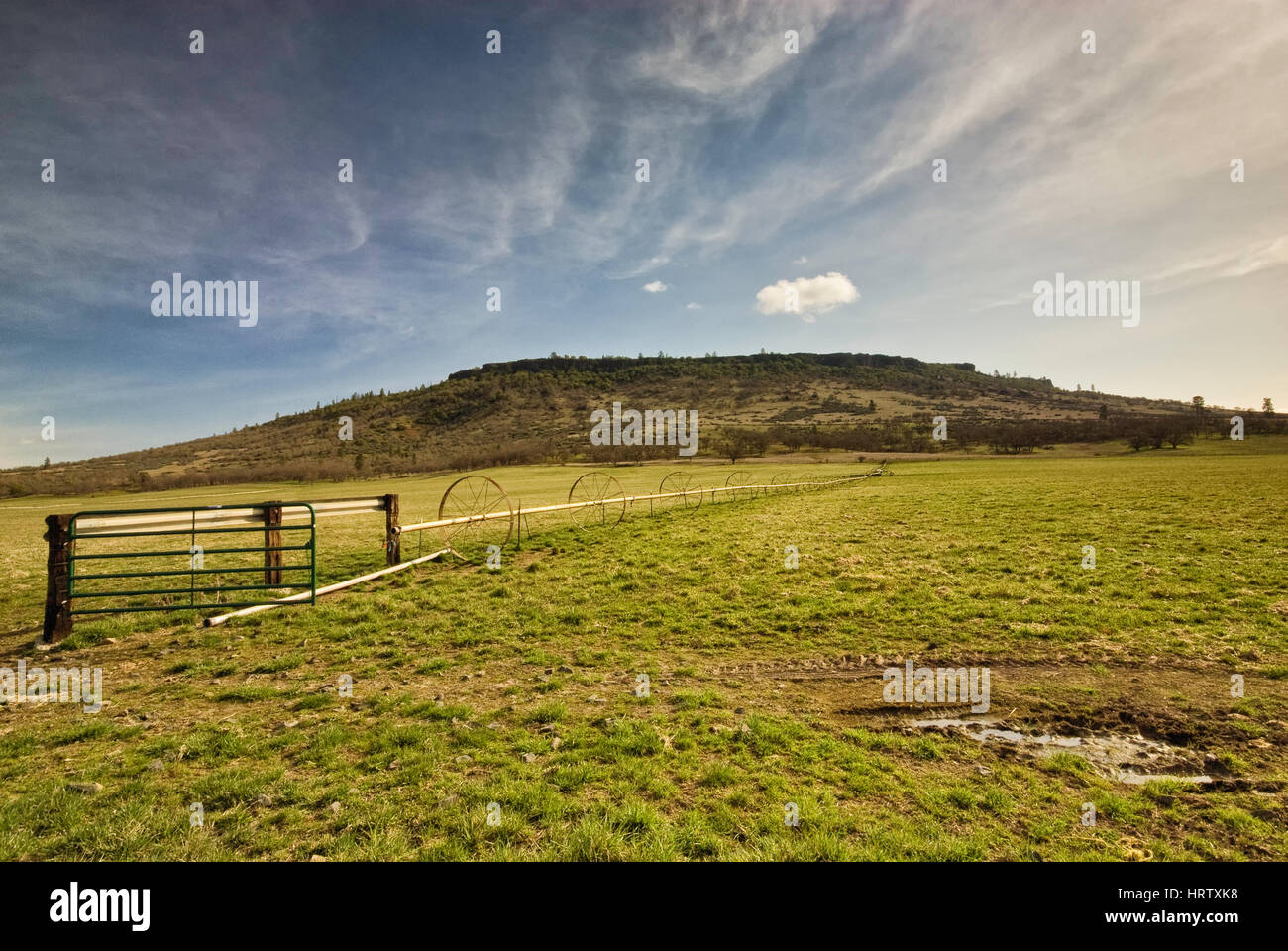 Upper Table Rock volcanic plateau over fields with wheel line sprinkler ...