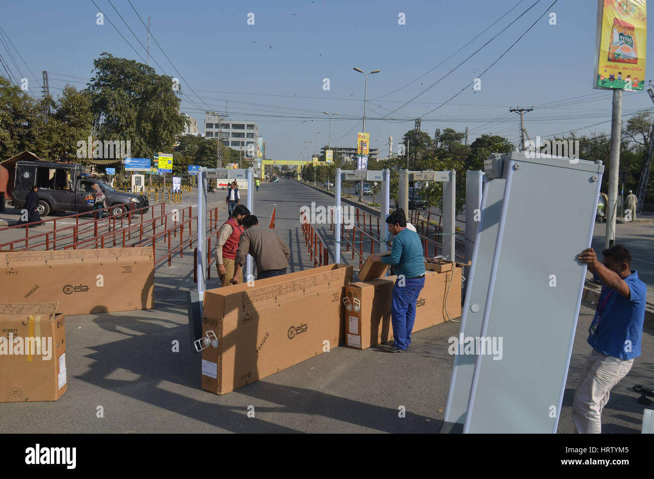 Lahore, Pakistan. 04th Mar, 2017. Pakistani technicians install ...