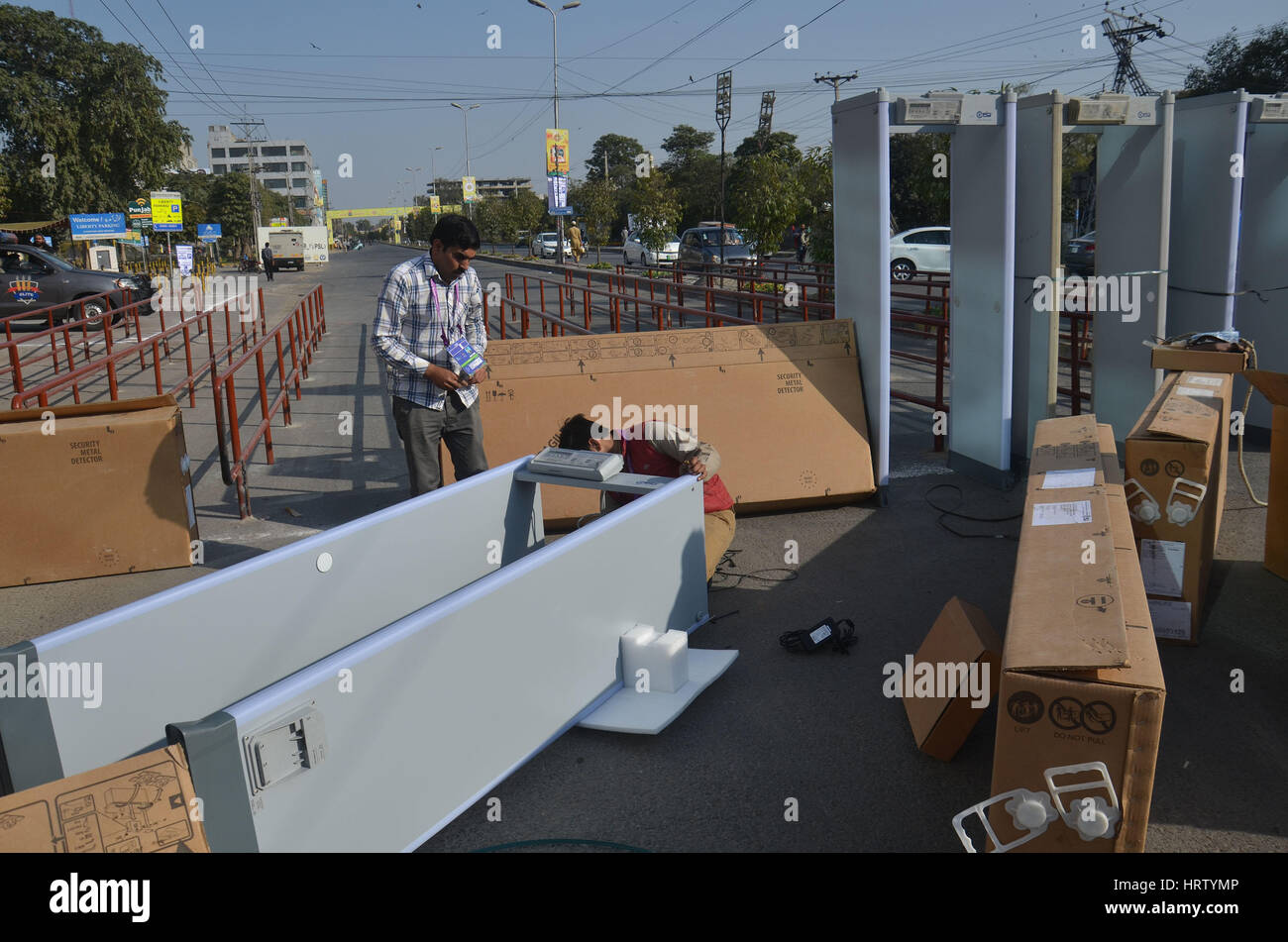 Lahore, Pakistan. 04th Mar, 2017. Pakistani technicians install ...