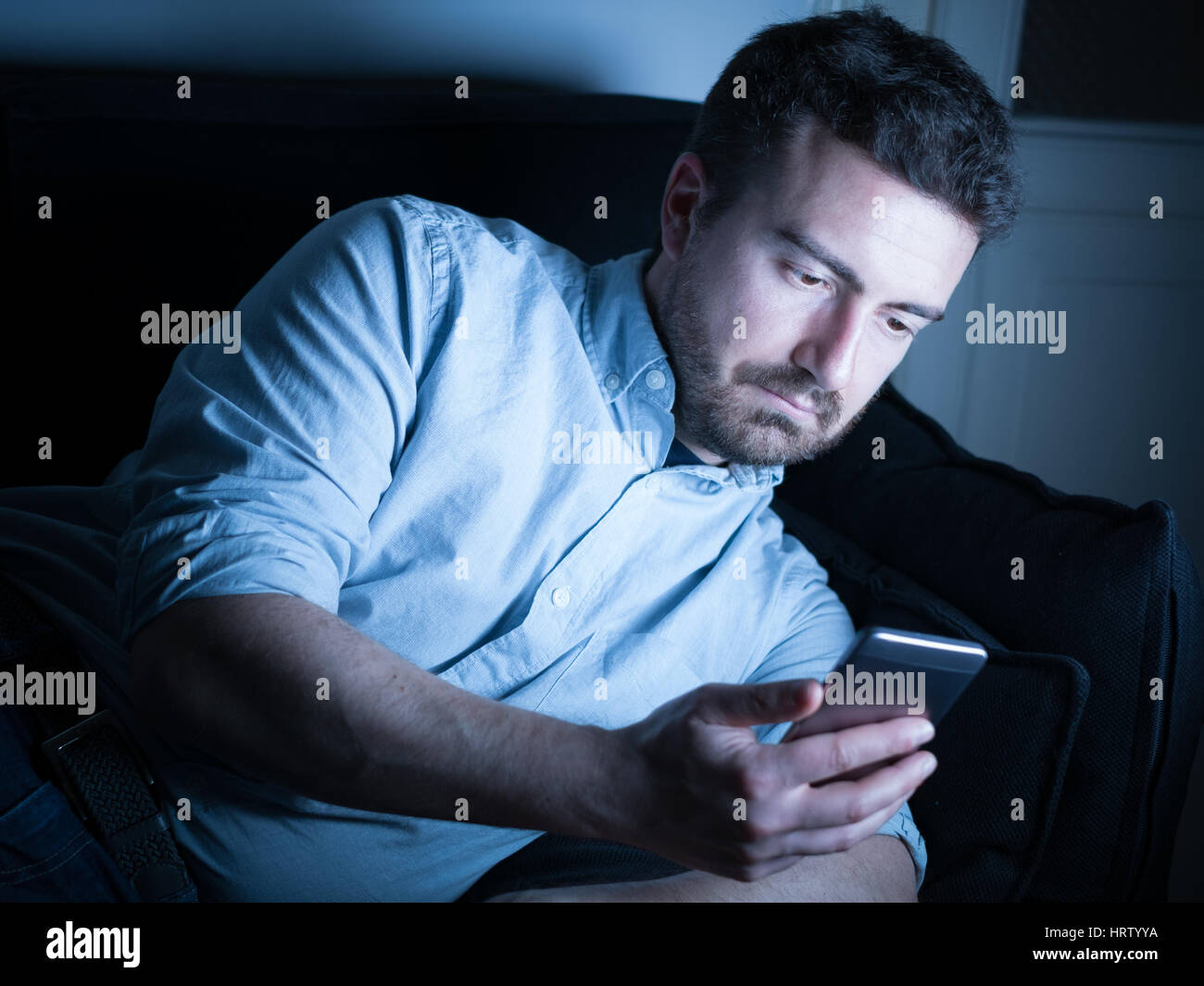 Man phone night bedtime hi-res stock photography and images - Alamy