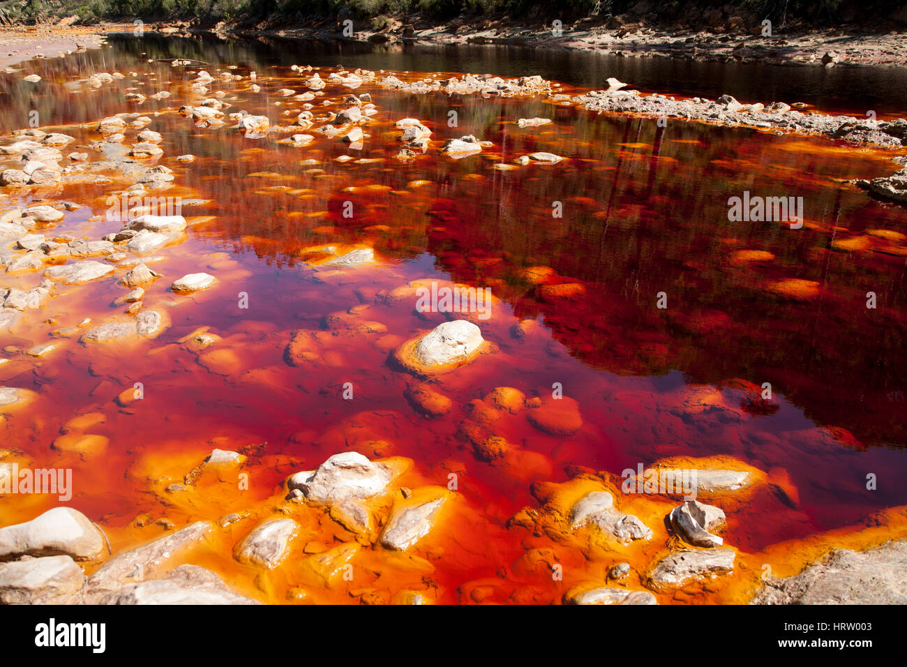 Blood red mineral laden water Rio Tinto river Minas de Riotinto mining ...