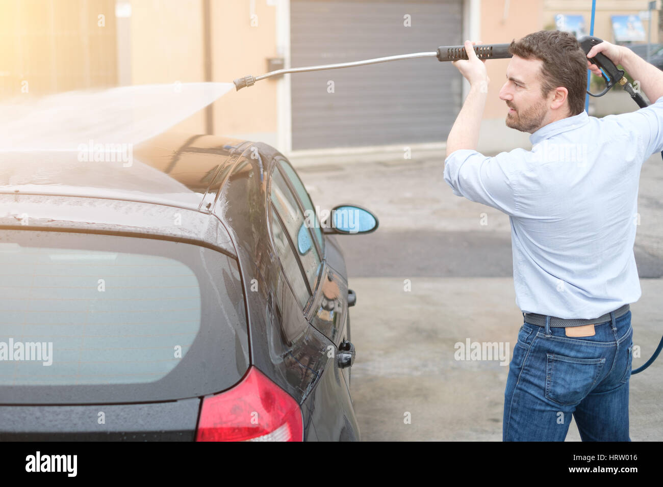 Man washing his car hi-res stock photography and images - Alamy