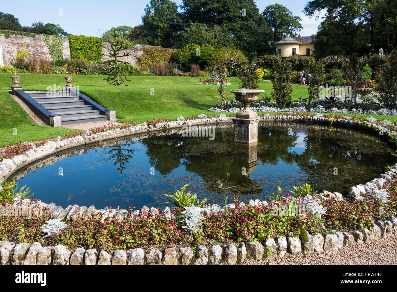 Formal gardens with beautiful garden pond feature Stock Photo - Alamy