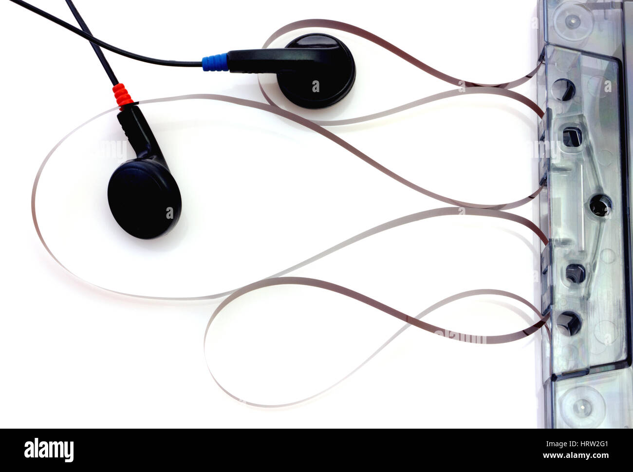 Audio tape and headset isolated on white Stock Photo - Alamy