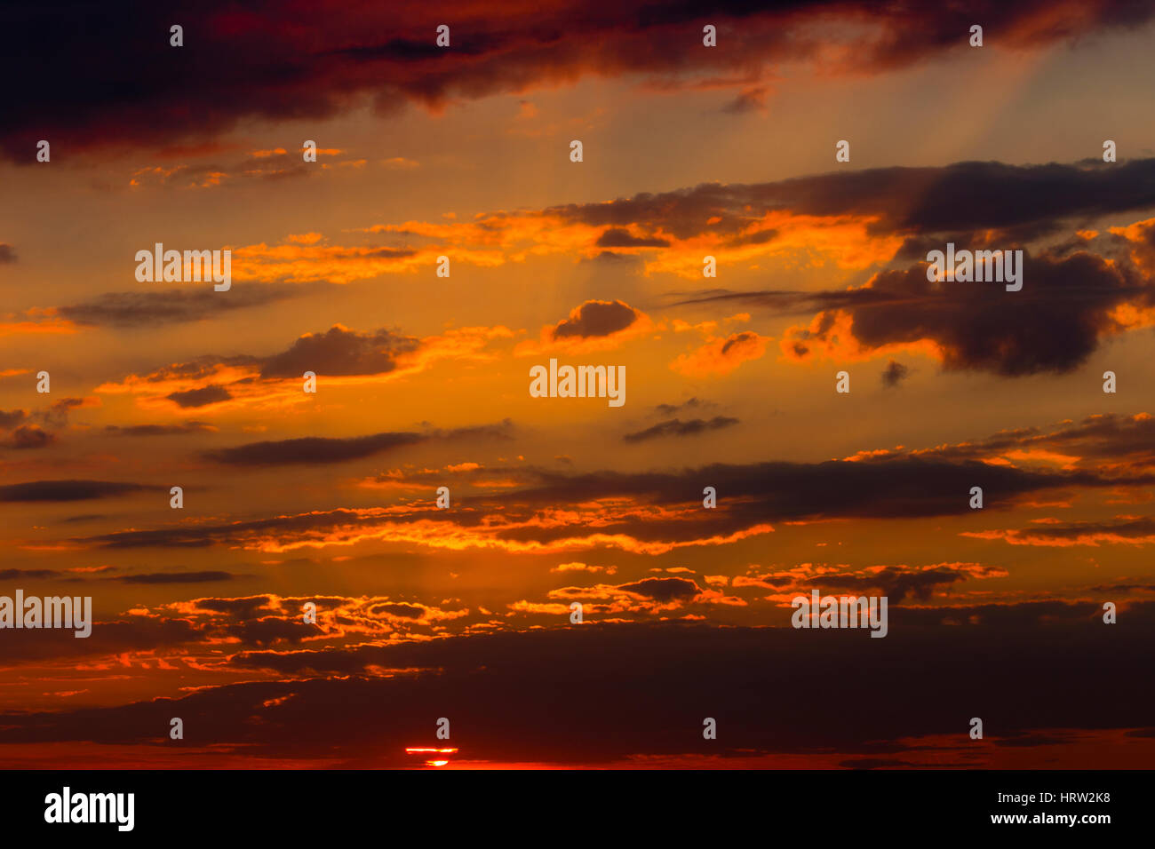 Beautiful sunset with dramatic clouds in the sky Stock Photo - Alamy