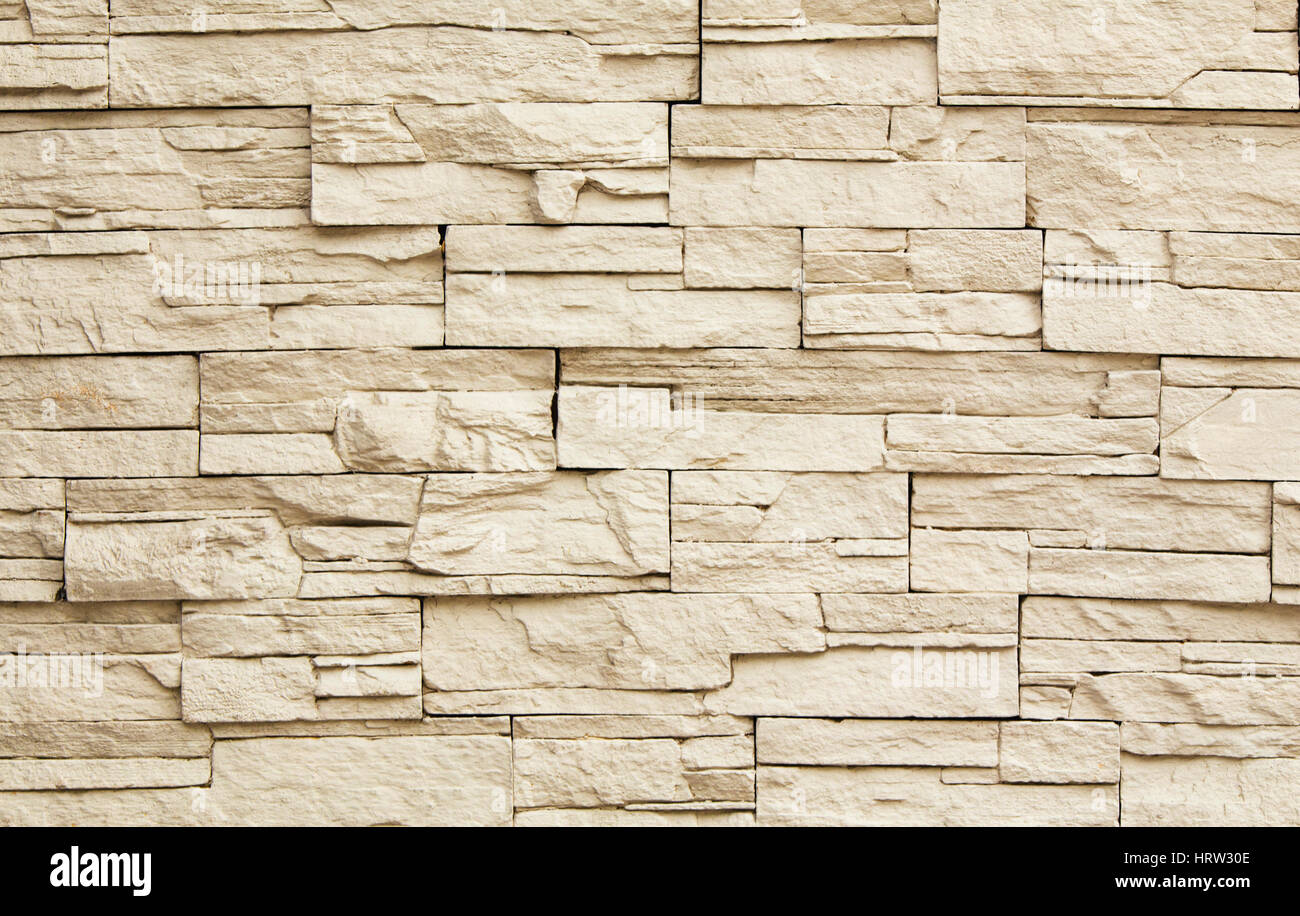 Stylish stone wall background Stock Photo - Alamy