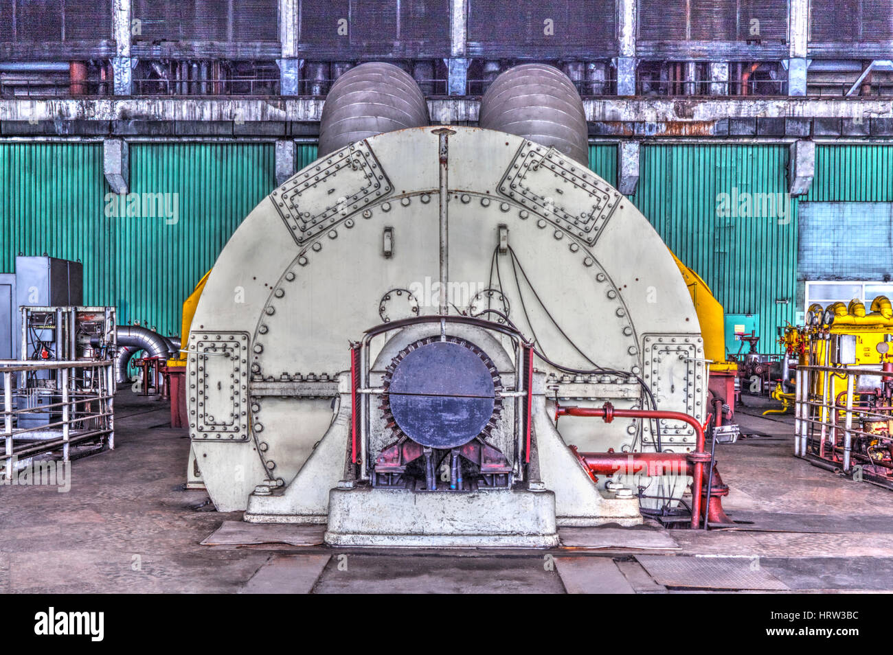 Machine room in thermal power plant with electric generators and ...