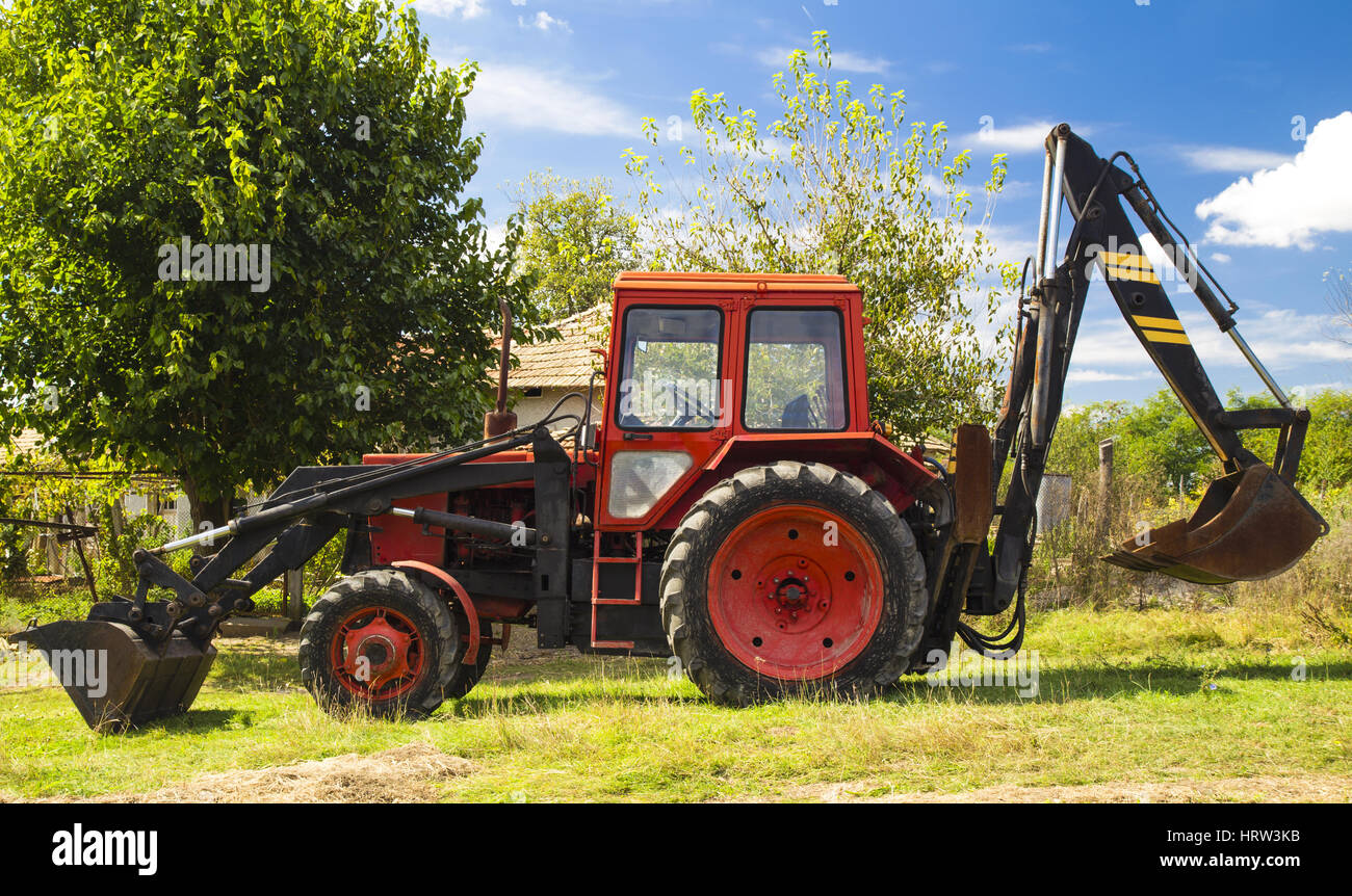 Red tractor closeup Stock Photo - Alamy
