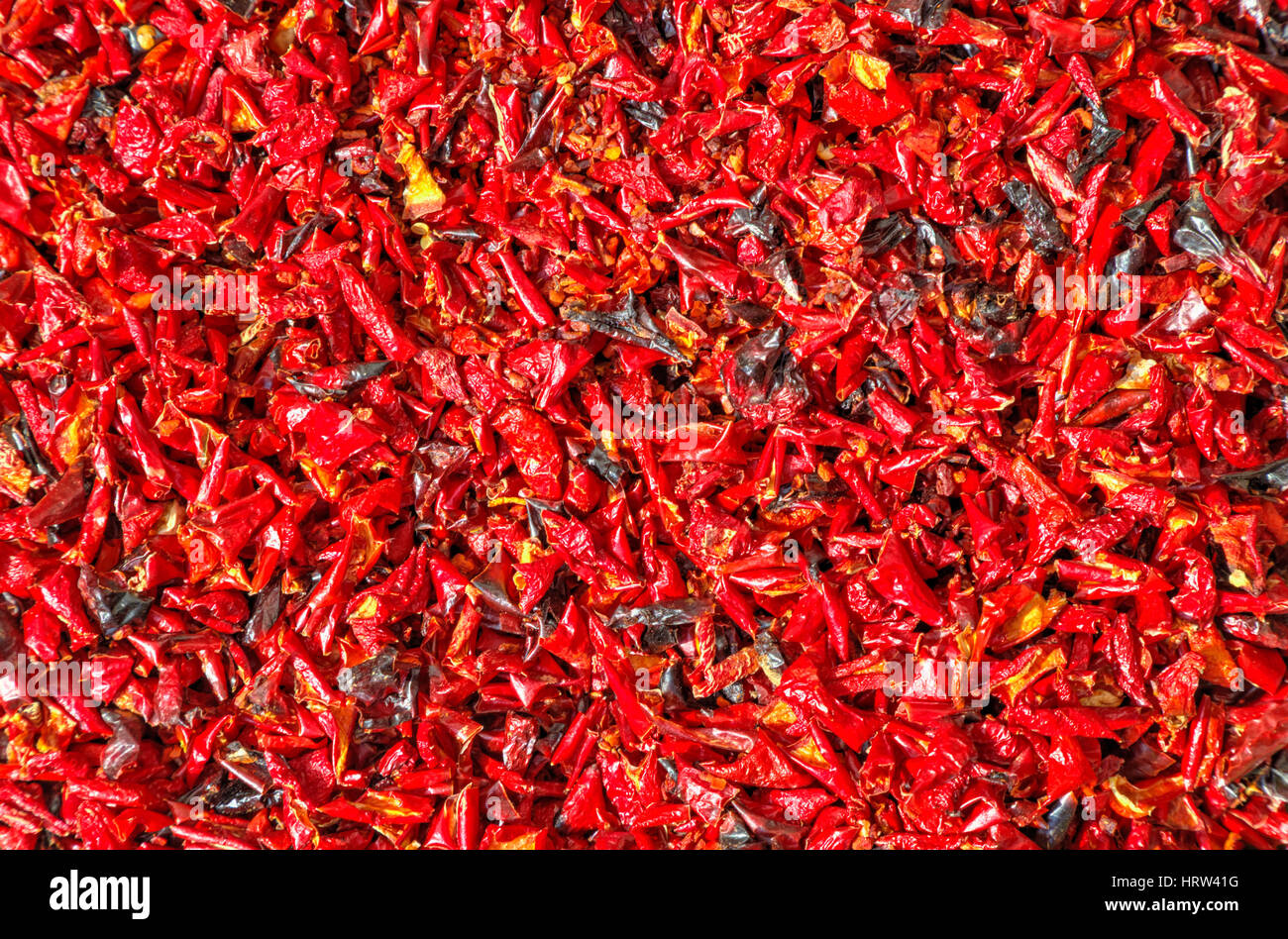 Drying chopped red pepper background Stock Photo - Alamy