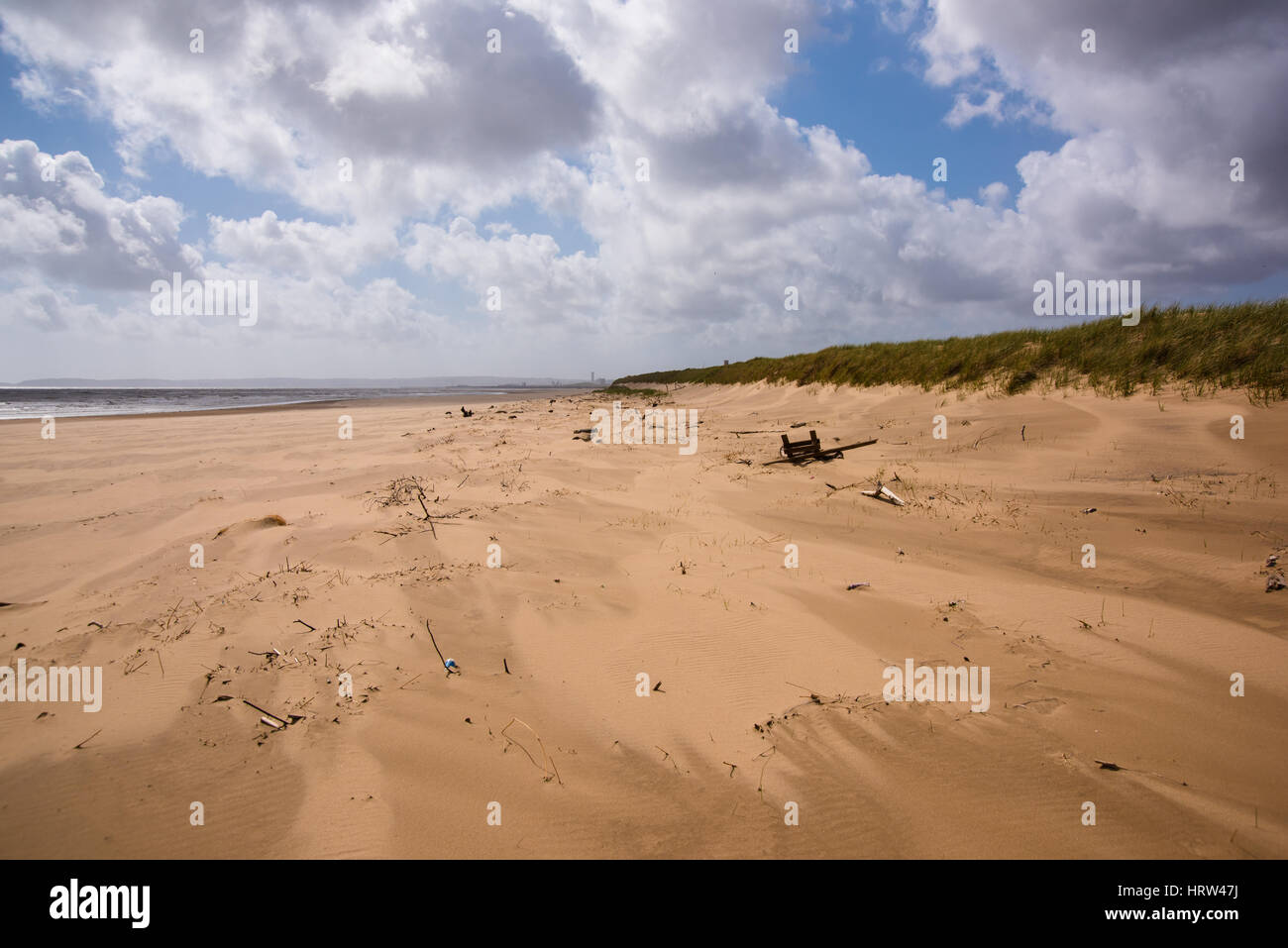 The beach at Crymlyn Burrows and Baglan Bay, near Swansea, South Wales ...