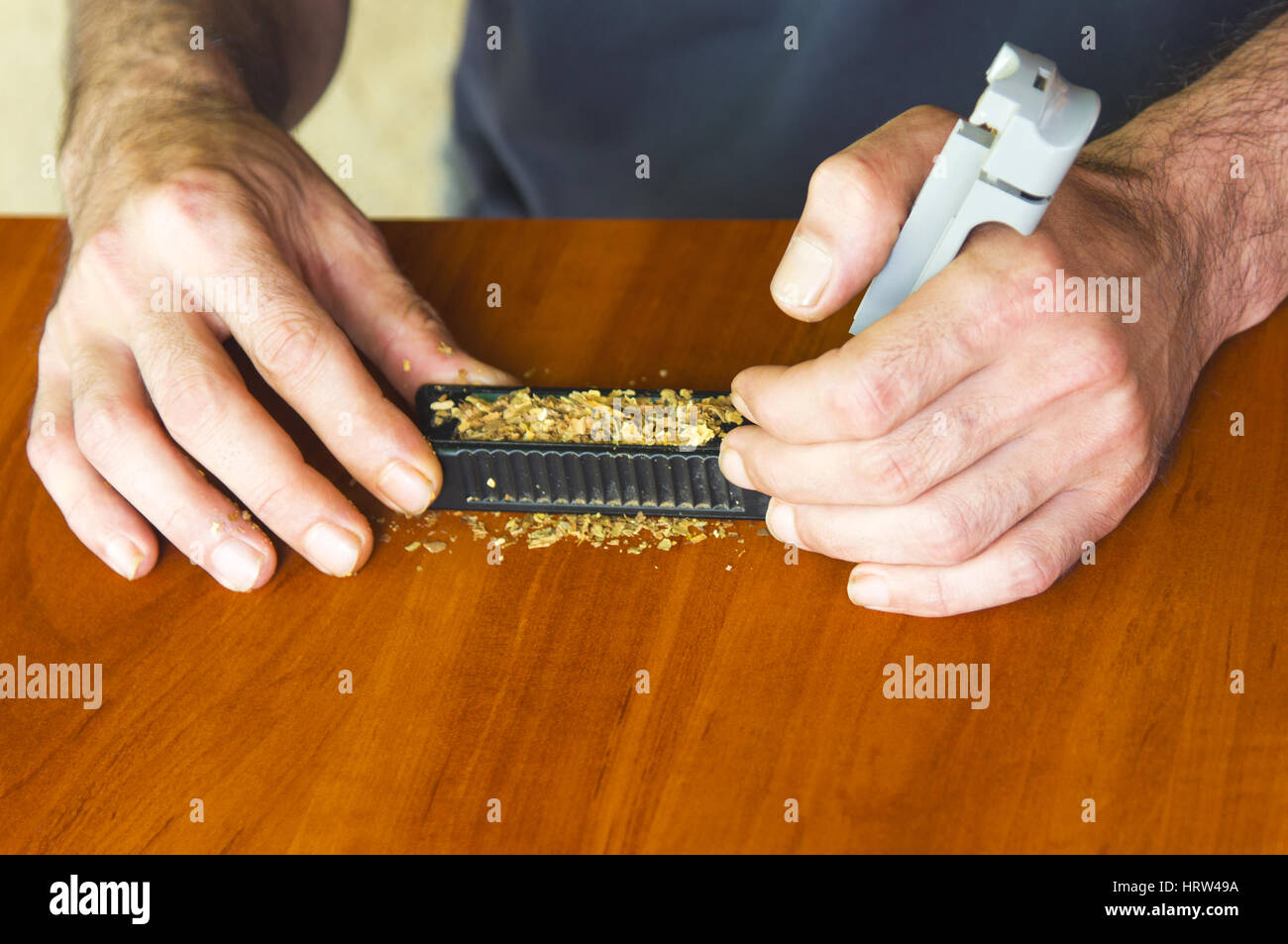 Making cigarettes handmade using hi-res stock photography and images ...