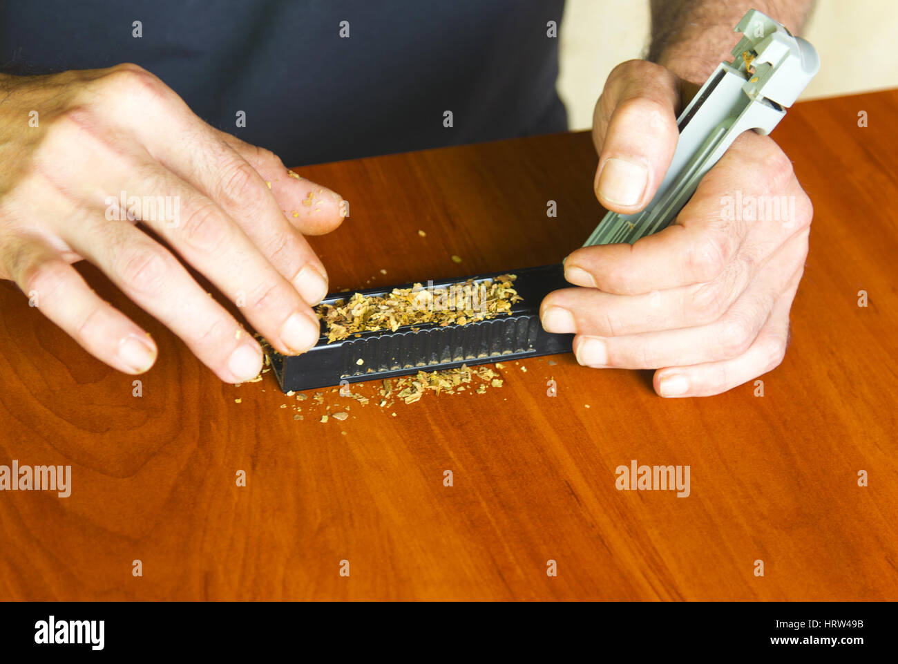 Making cigarettes handmade using hi-res stock photography and images ...