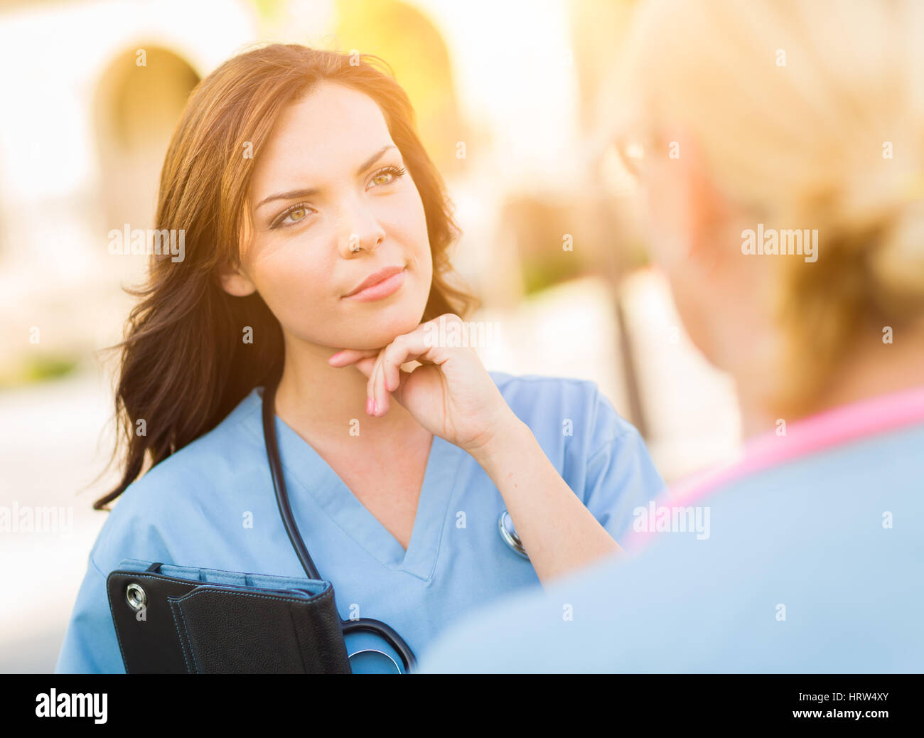 Smiling doctors outside hi-res stock photography and images - Alamy