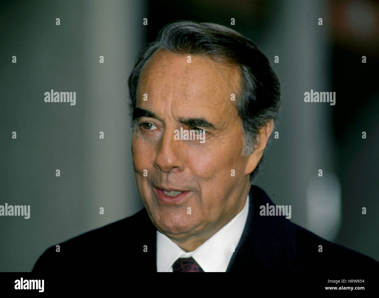 Republican Senator Robert Dole of Kansas talks with reporters outside ...