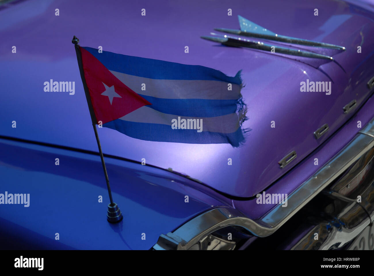 Bonnet of purple vintage car with Cuban Flag, Parque Central, Havana ...