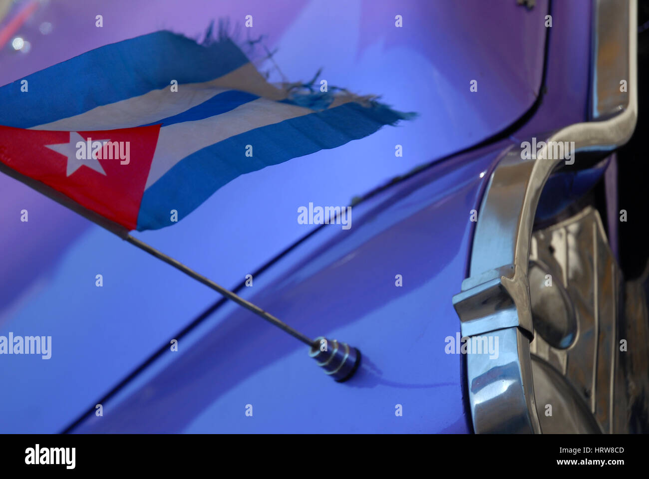 Bonnet of purple vintage car with Cuban Flag, Parque Central, Havana ...