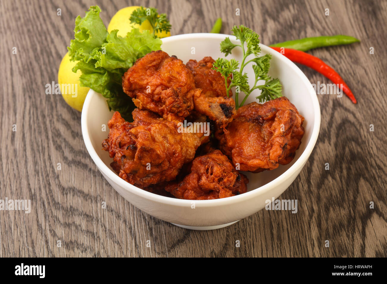 Indian traditional cuisine - Chicken lollipops with spices Stock Photo ...