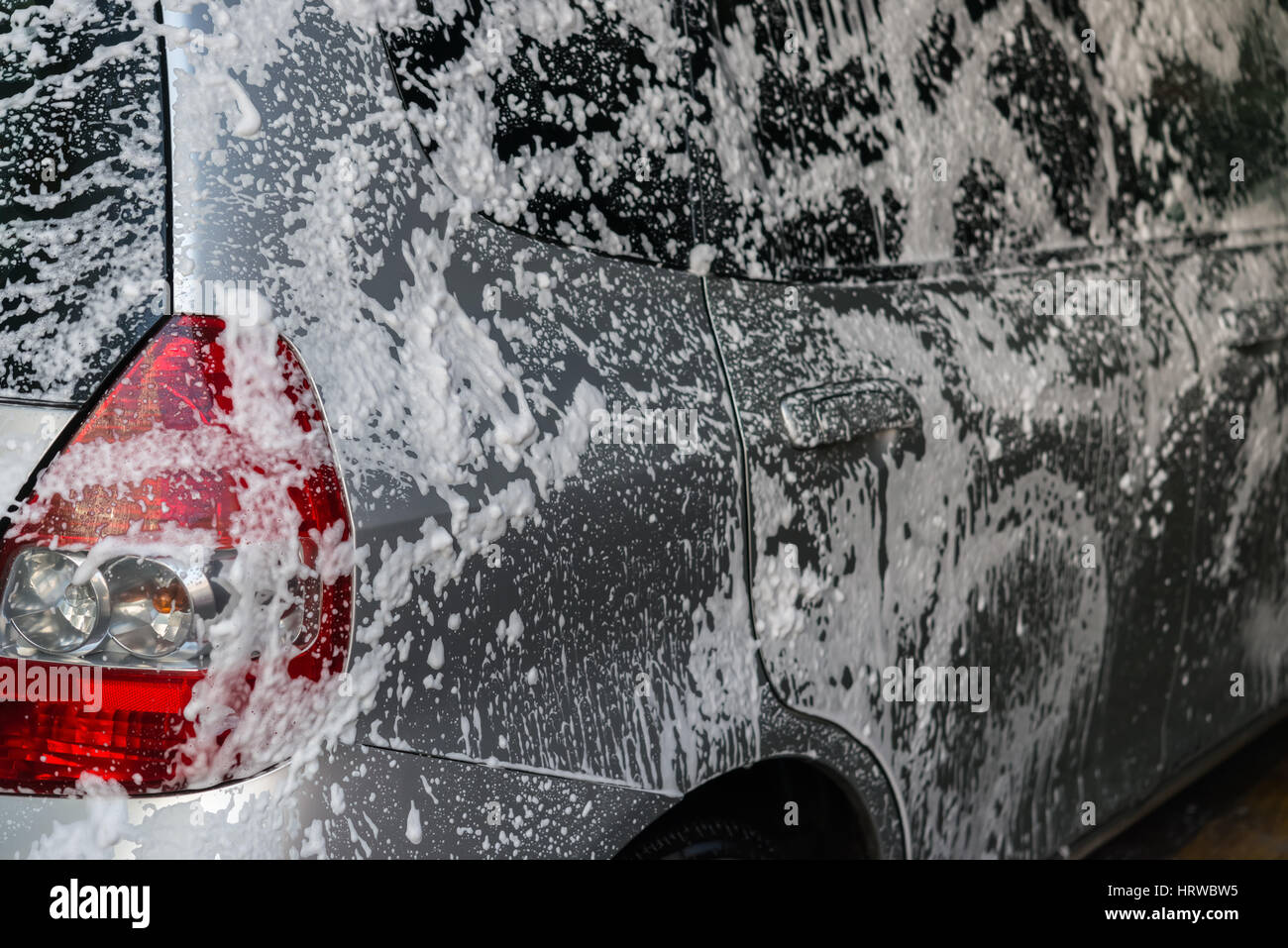 washing a car with soapy water Stock Photo - Alamy
