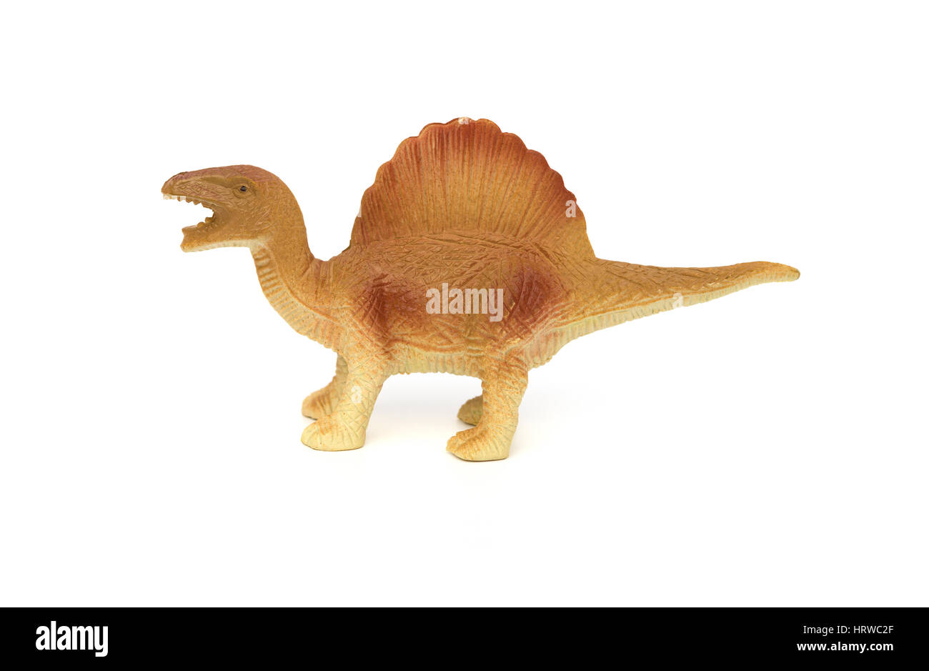 side view brown spinosaurus toy on a white background Stock Photo - Alamy