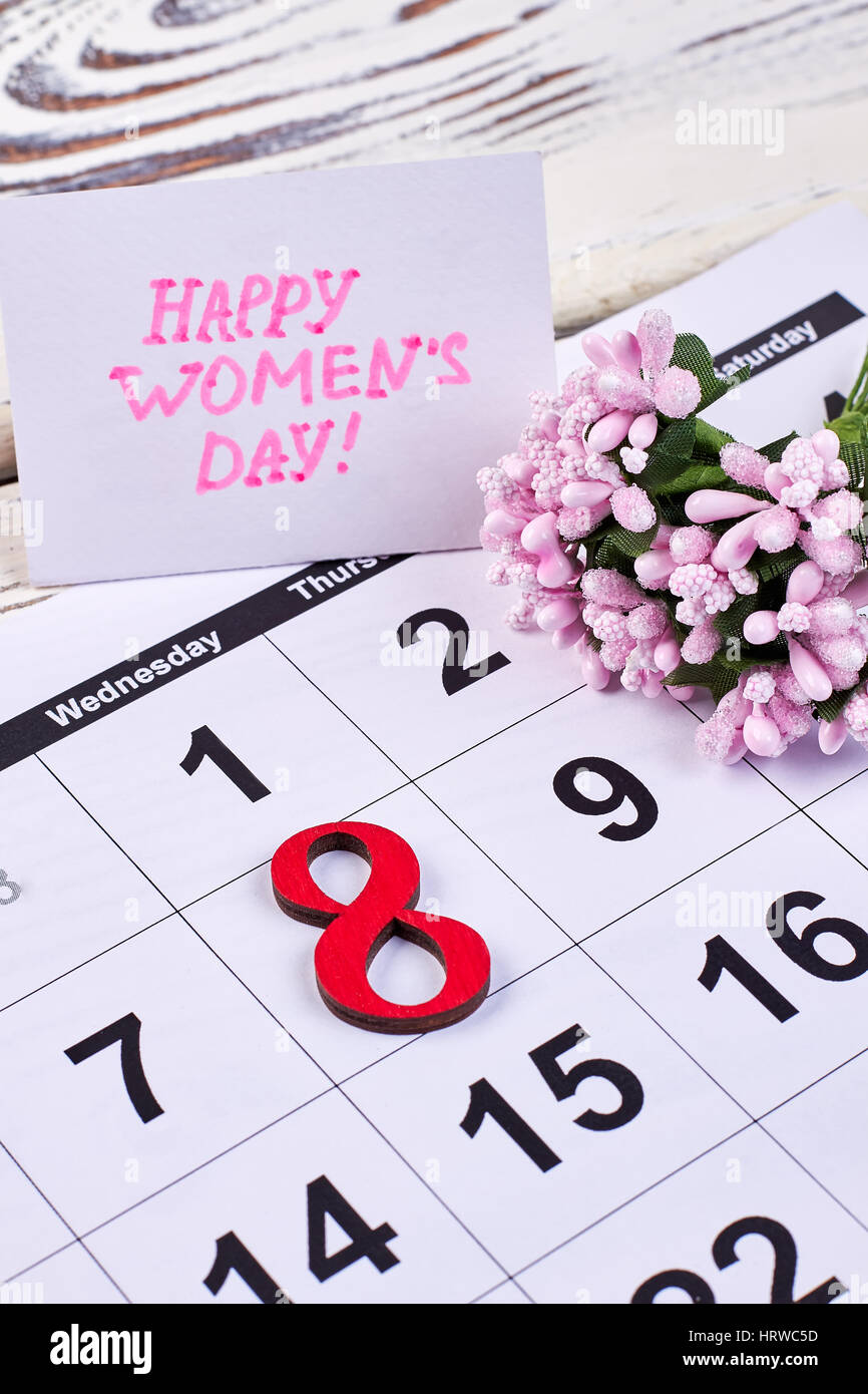 Flower and calendar on wood. Congratulation with Women's day Stock ...
