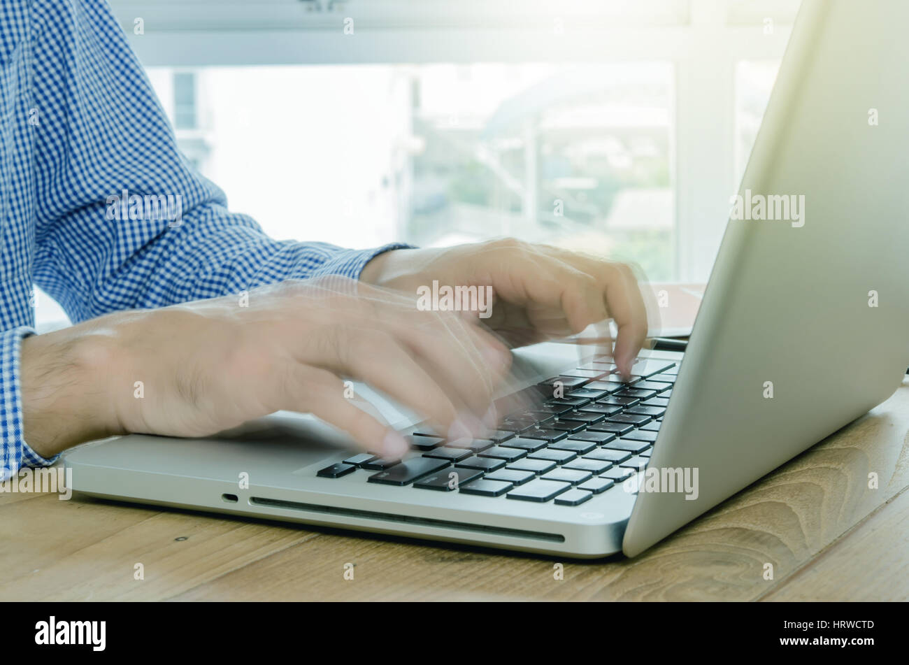 Typing computer keyboard laptop blurred hi-res stock photography and ...