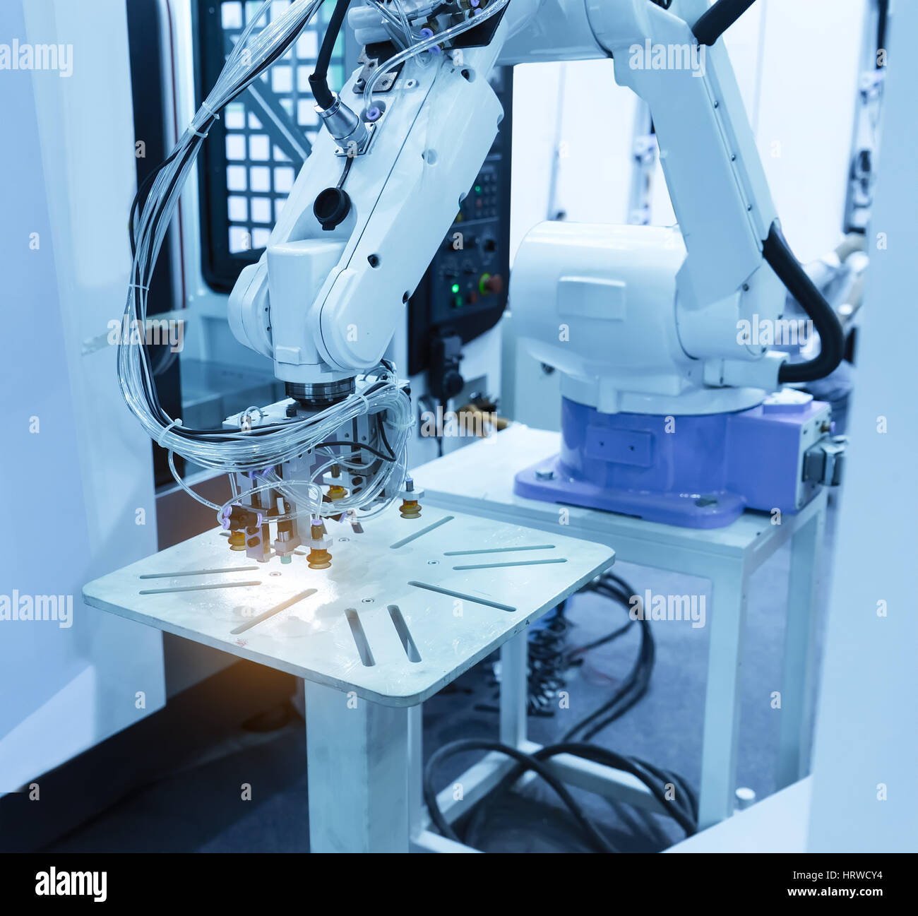 Automatic robot in assembly line working in factory. Smart factory ...