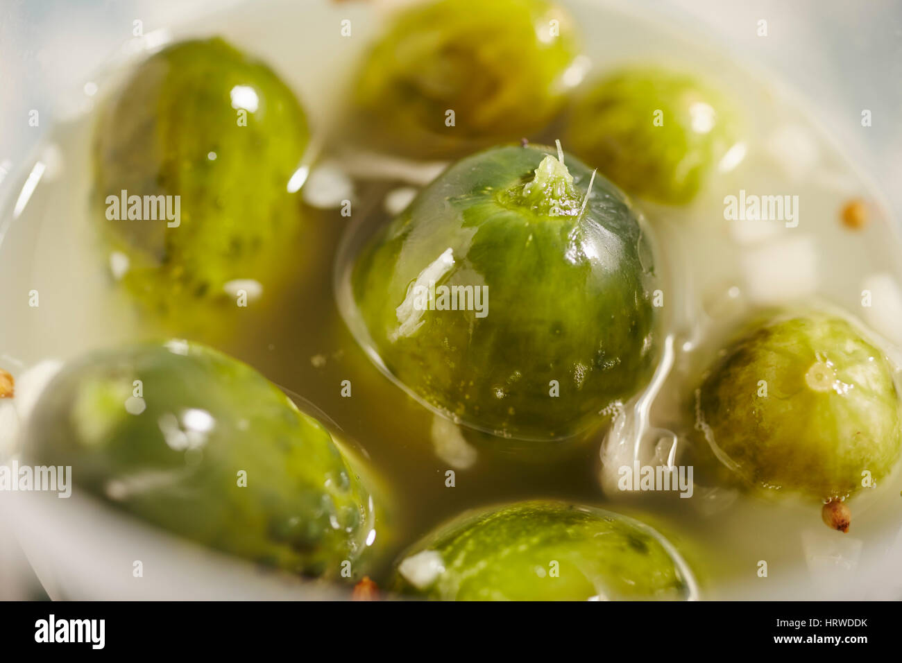 a container of traditional half-sour pickles Stock Photo - Alamy