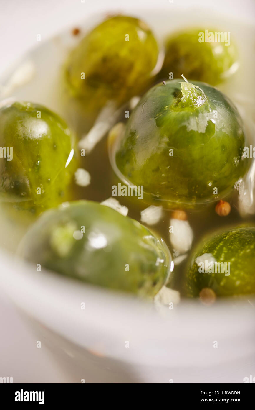a container of traditional half-sour pickles Stock Photo - Alamy