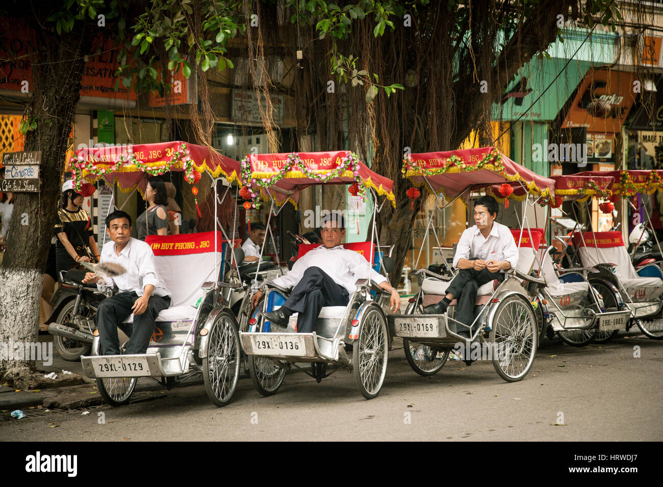 Red rickshaws hi-res stock photography and images - Alamy
