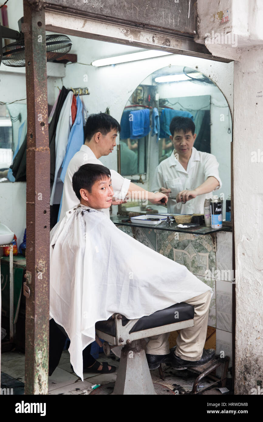 Haircut on street hi-res stock photography and images - Alamy