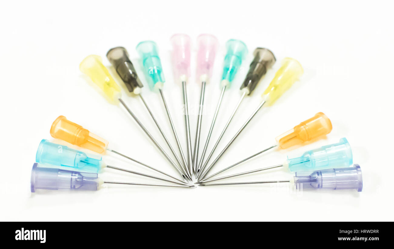Colorful Needles put in needle sheath sort on white background Stock ...