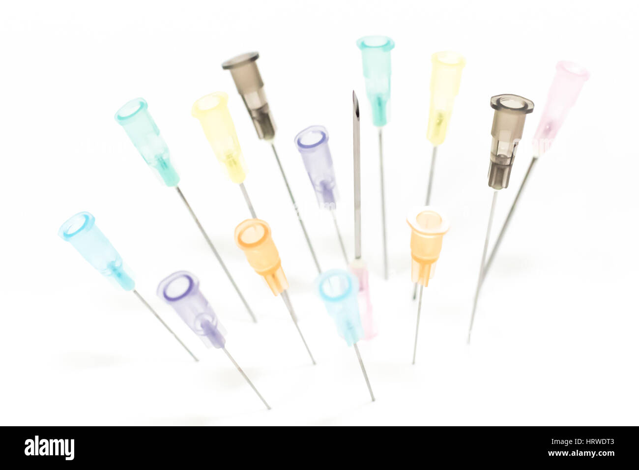 Colorful Needles put in needle sheath on white background Stock Photo ...