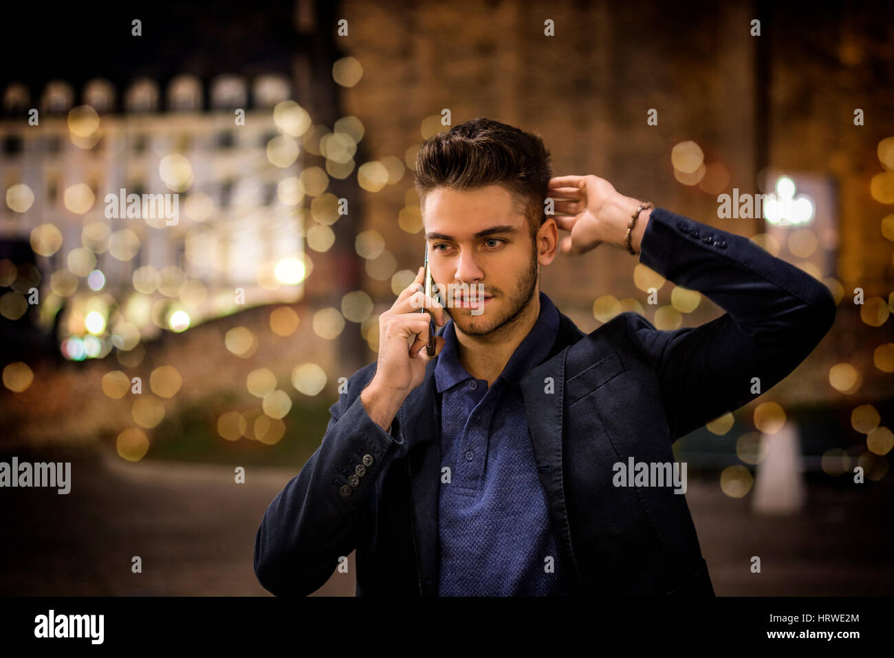 Young man talking phone italy hi-res stock photography and images - Alamy