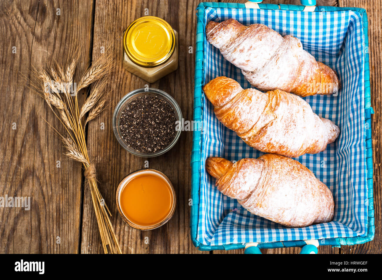 Delicious crispy croissants in bread basket. Studio Photo Stock Photo ...