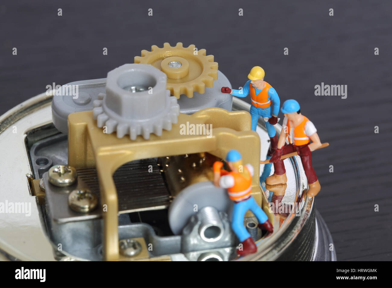 Selective focus of miniature engineer and worker to fixed and repair ...