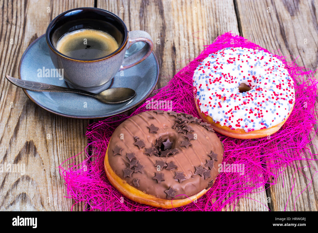 Fresh sweet donuts with colored glaze. Studio Photo Stock Photo - Alamy