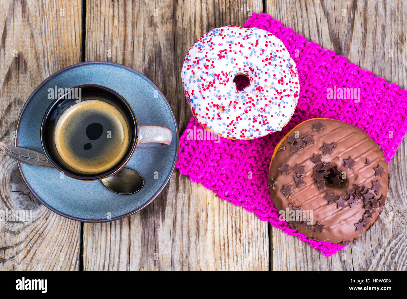 Fresh sweet donuts with colored glaze. Studio Photo Stock Photo - Alamy