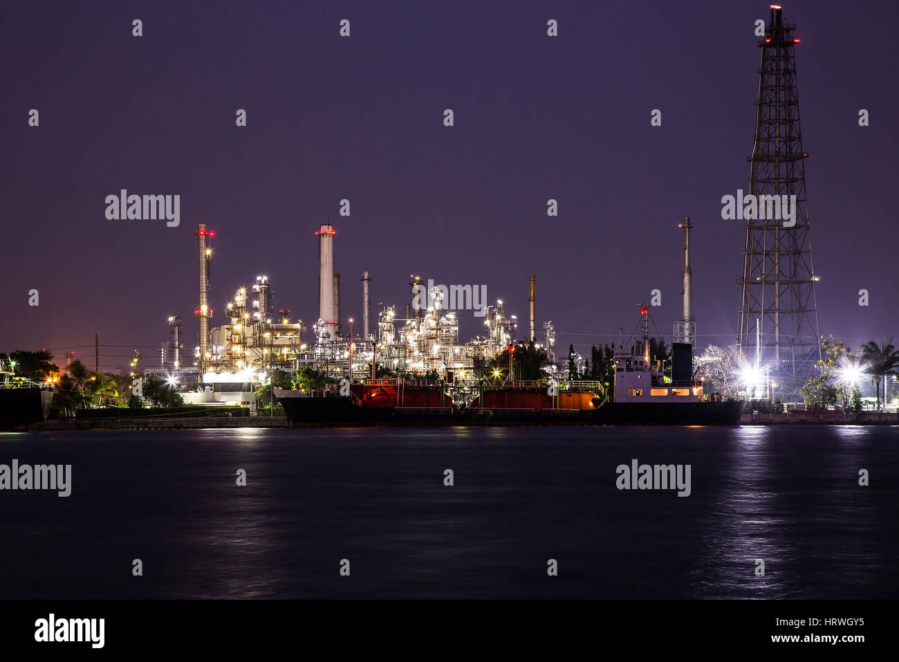 Oil refinery industry plant at night Stock Photo - Alamy