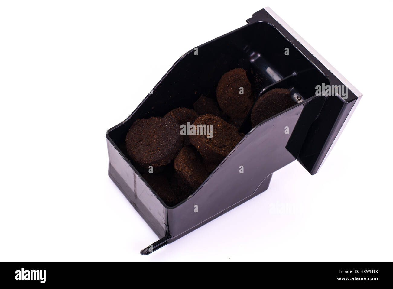 Pressed coffee waste container on white. Studio Photo Stock Photo - Alamy