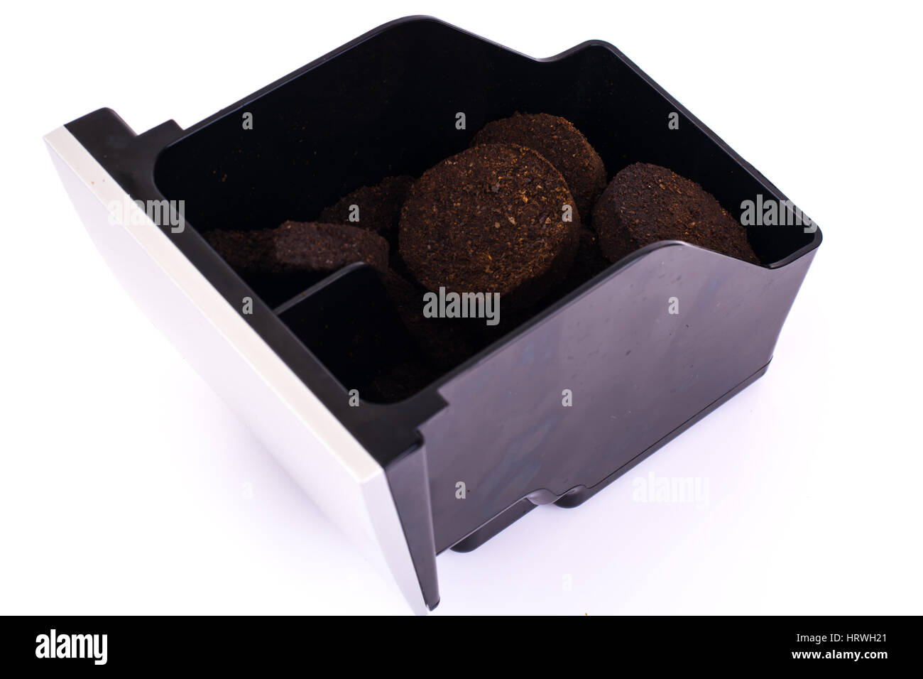 Pressed coffee waste container on white. Studio Photo Stock Photo - Alamy