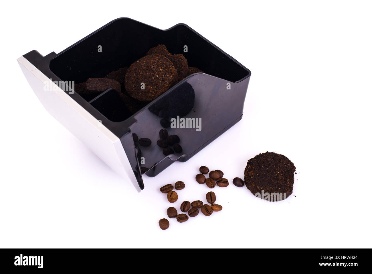 Pressed coffee waste container on white. Studio Photo Stock Photo - Alamy