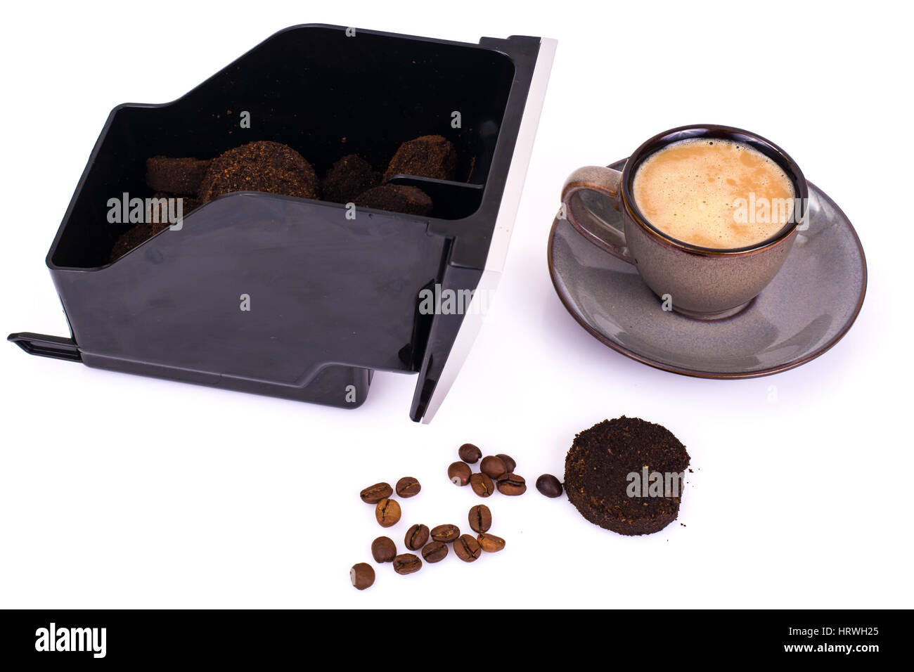 Pressed coffee waste container on white. Studio Photo Stock Photo - Alamy