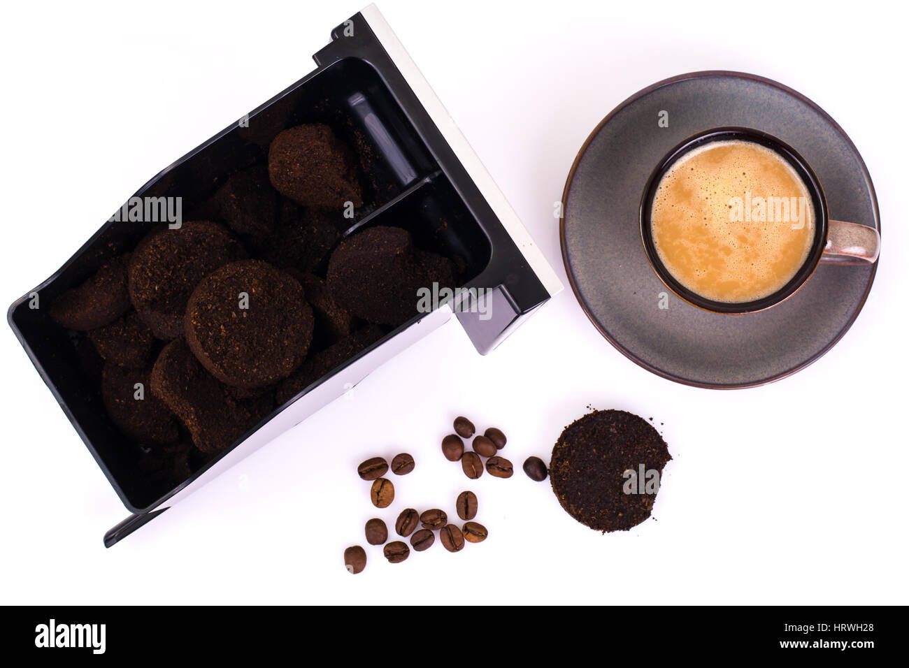 Pressed coffee waste container on white. Studio Photo Stock Photo - Alamy