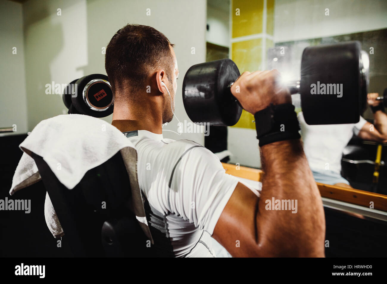 bodybuilder pumping up hands in gym. Gym work out Stock Photo - Alamy