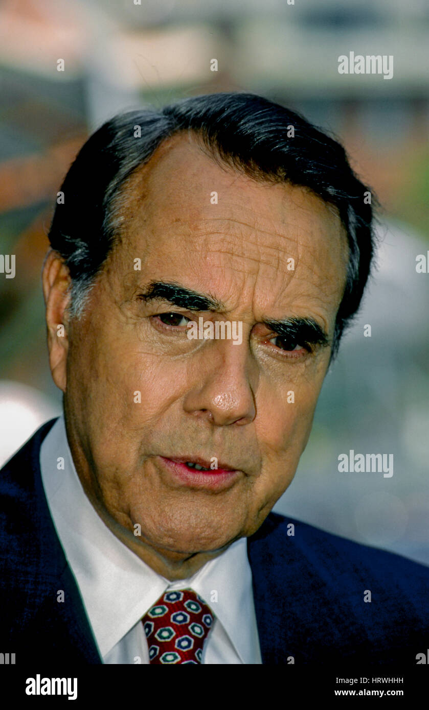 Senator Robert Dole Republican of Kansas talks with reorters outside ...