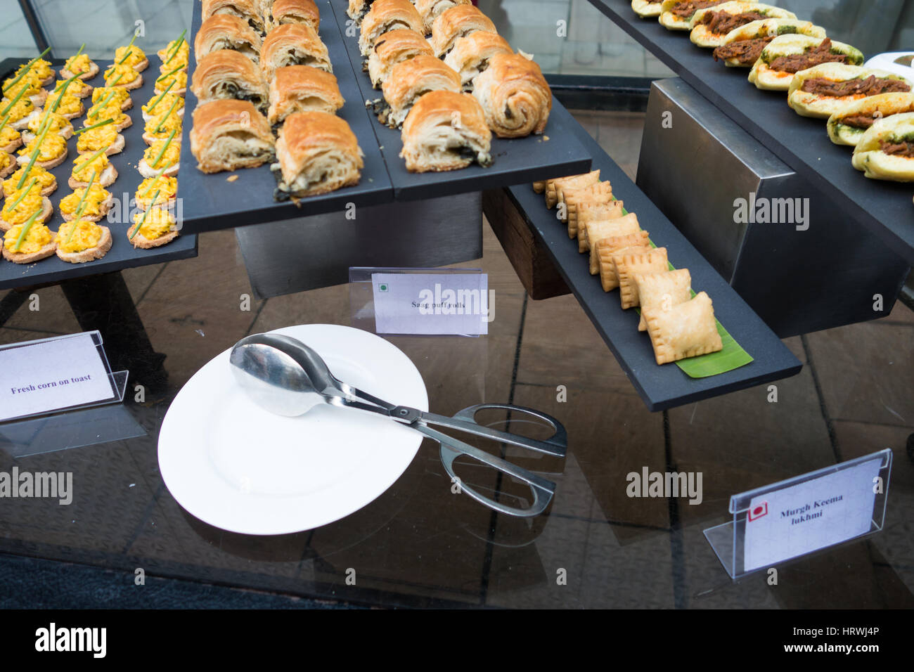 Small Sized Indian snacks consisting of Spinach Rolls,Lukmi and fresh ...
