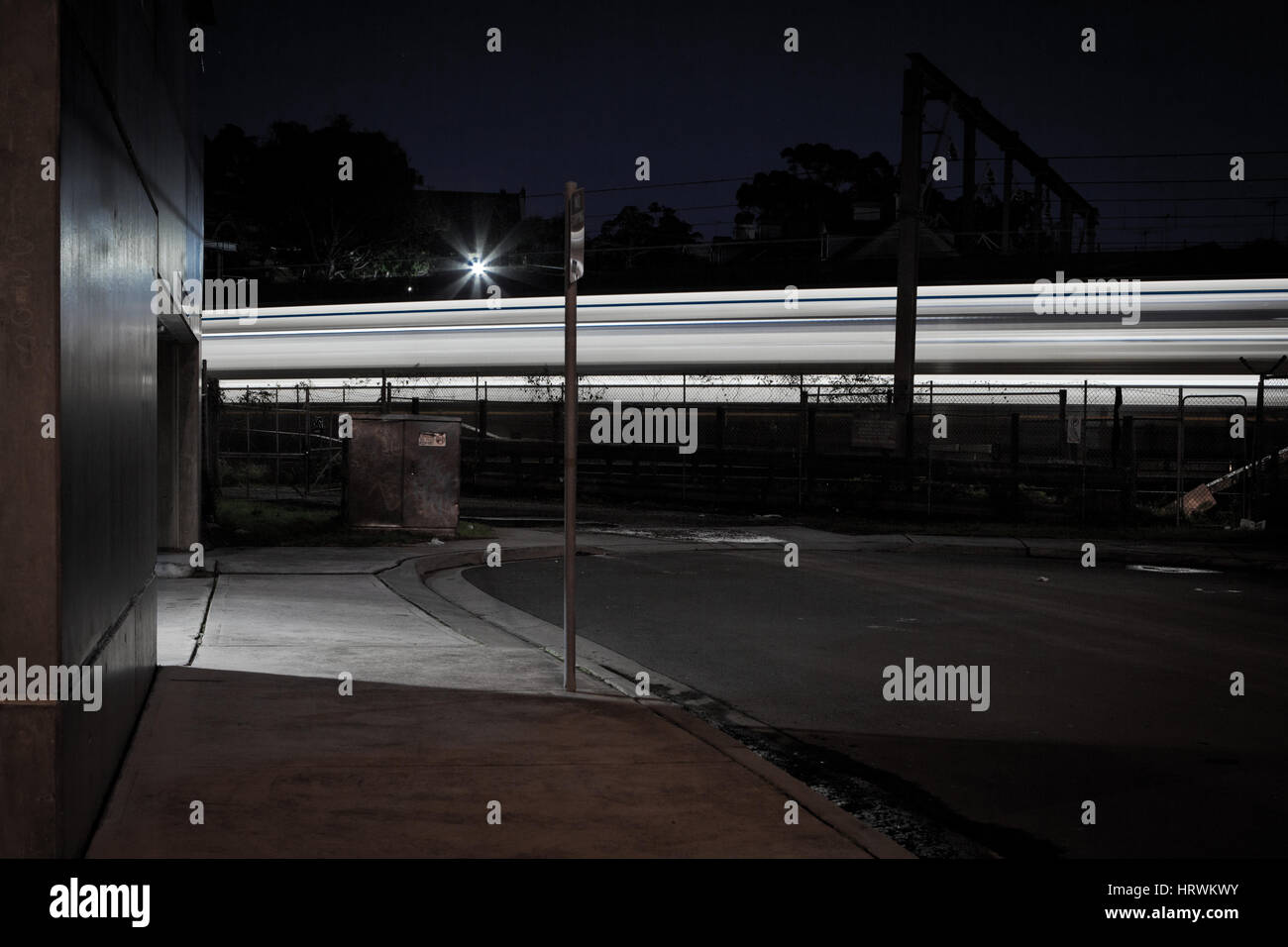 Moving train at night Stock Photo - Alamy