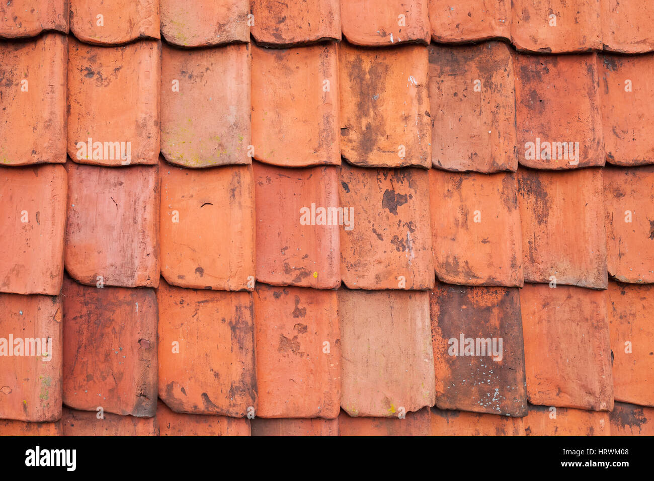 Vintage red roof tiling, close up frontal background photo texture ...