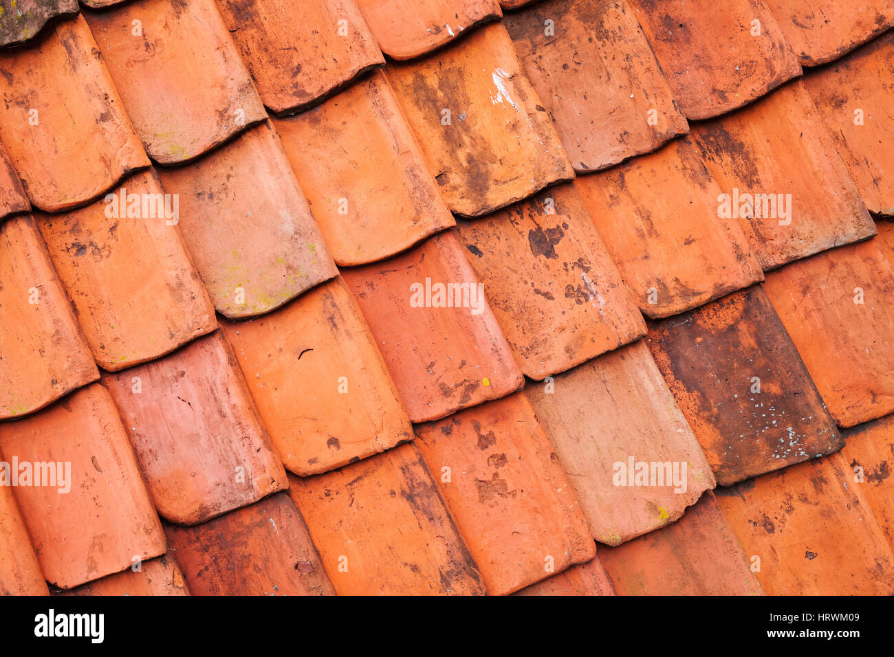 Vintage red roof tiling, close-up background photo texture, diagonal ...